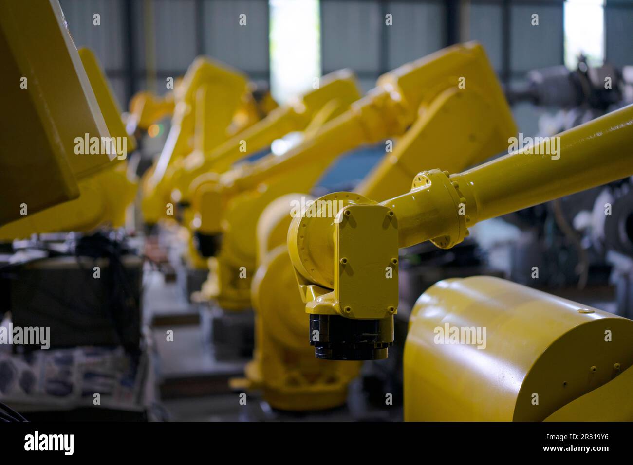 Engineer work at robotic arm factory. Technology and engineering ...