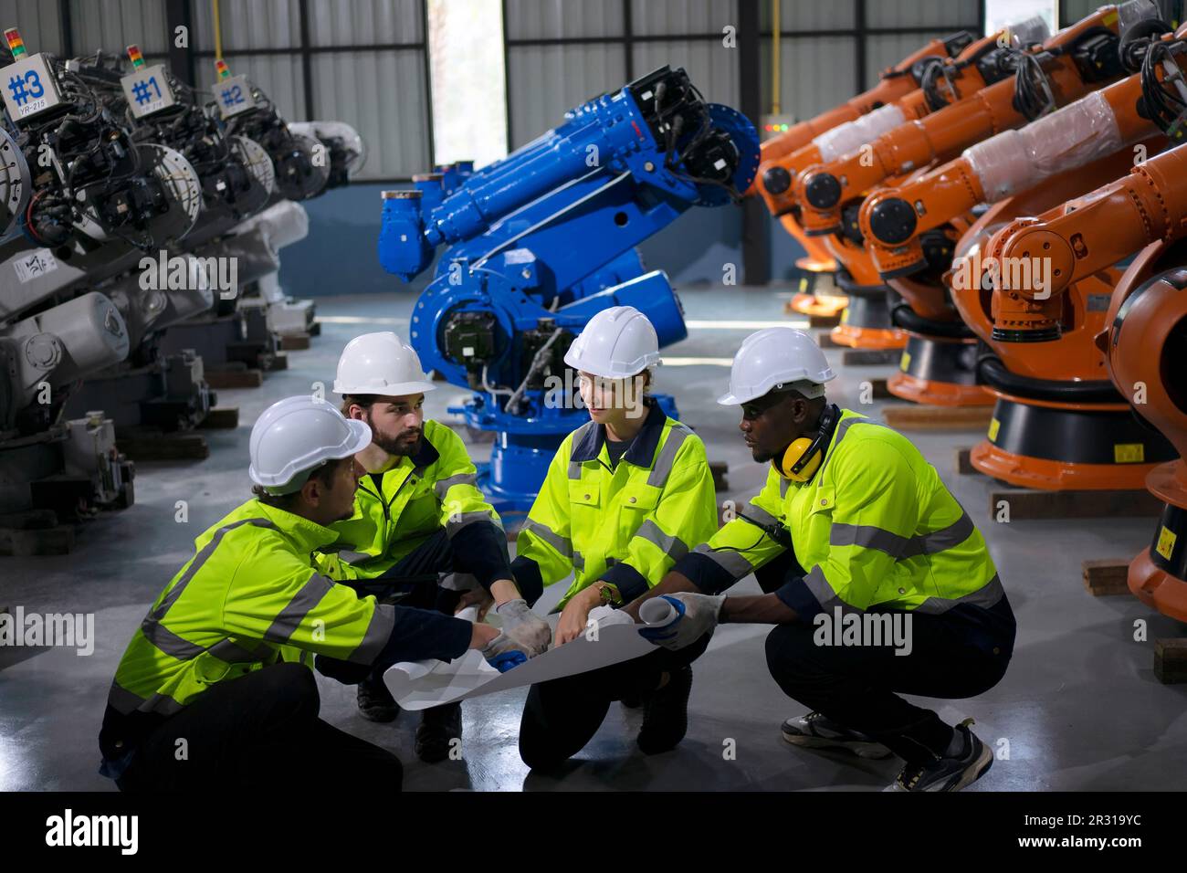 Engineer work at robotic arm factory. Technology and engineering ...