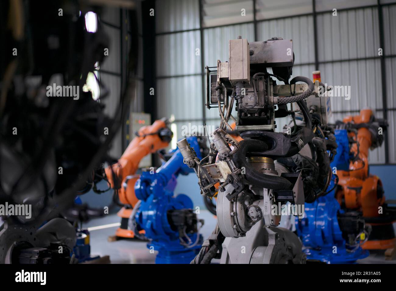 Engineer work at robotic arm factory. Technology and engineering ...