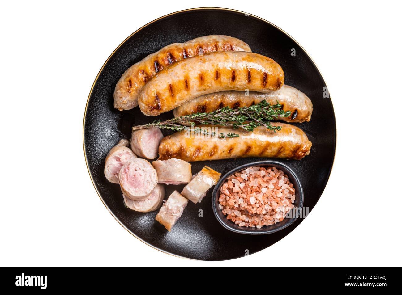 Roasted Bratwurst and Bockwurst pork meat sausages in a plate. Isolated ...