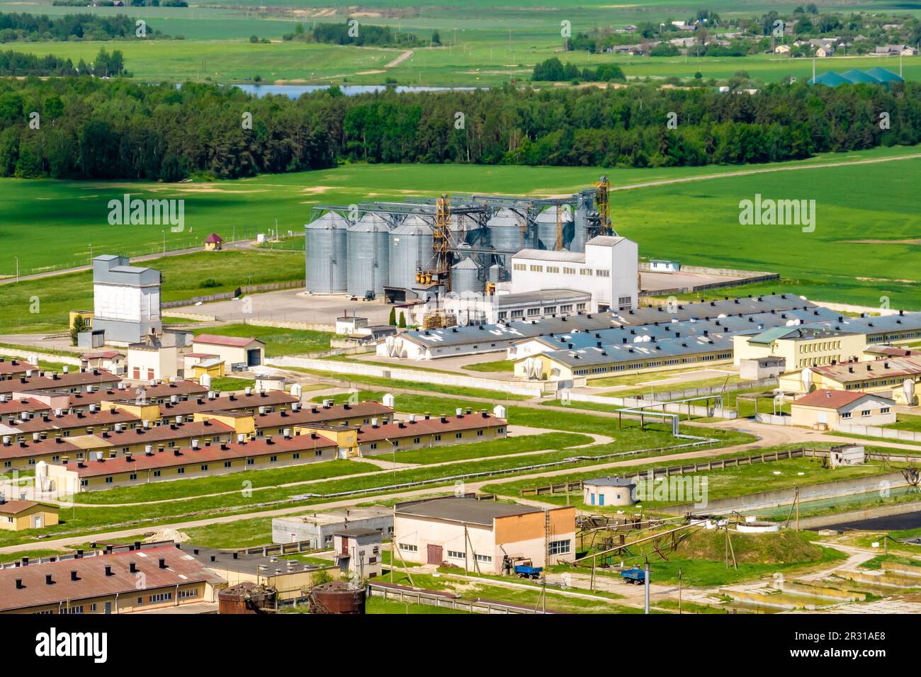 aerial panoramic view on agro-industrial complex with silos and grain ...
