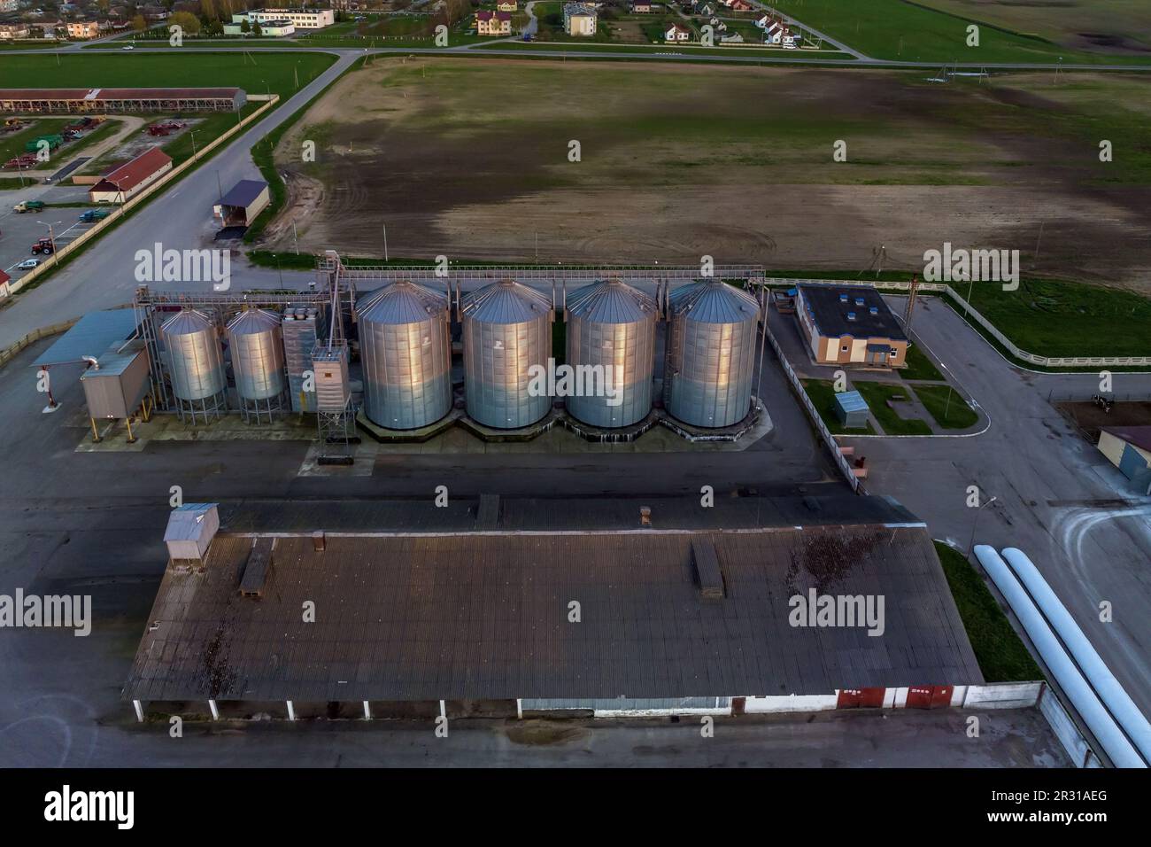 aerial panoramic view on agro-industrial complex with silos and grain ...