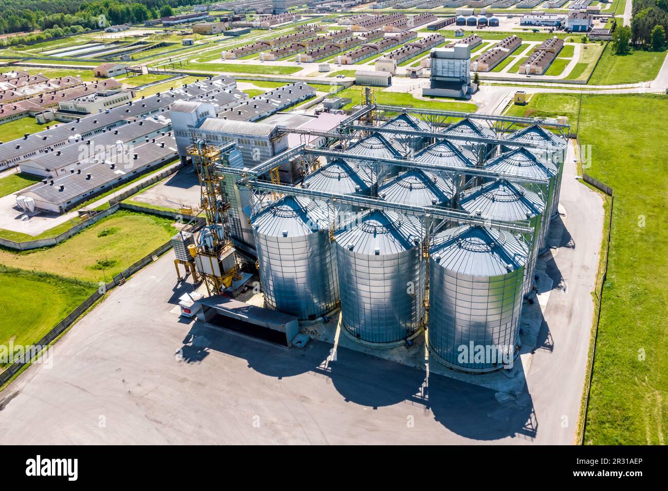 aerial panoramic view on agro-industrial complex with silos and grain ...
