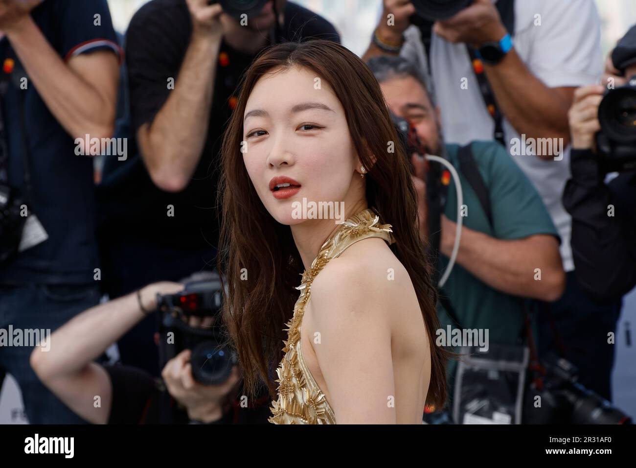 Dongyu Zhou poses for photographers at the photo call for the film 'The ...