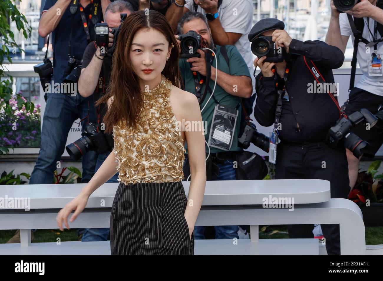 Dongyu Zhou poses for photographers at the photo call for the film 'The ...