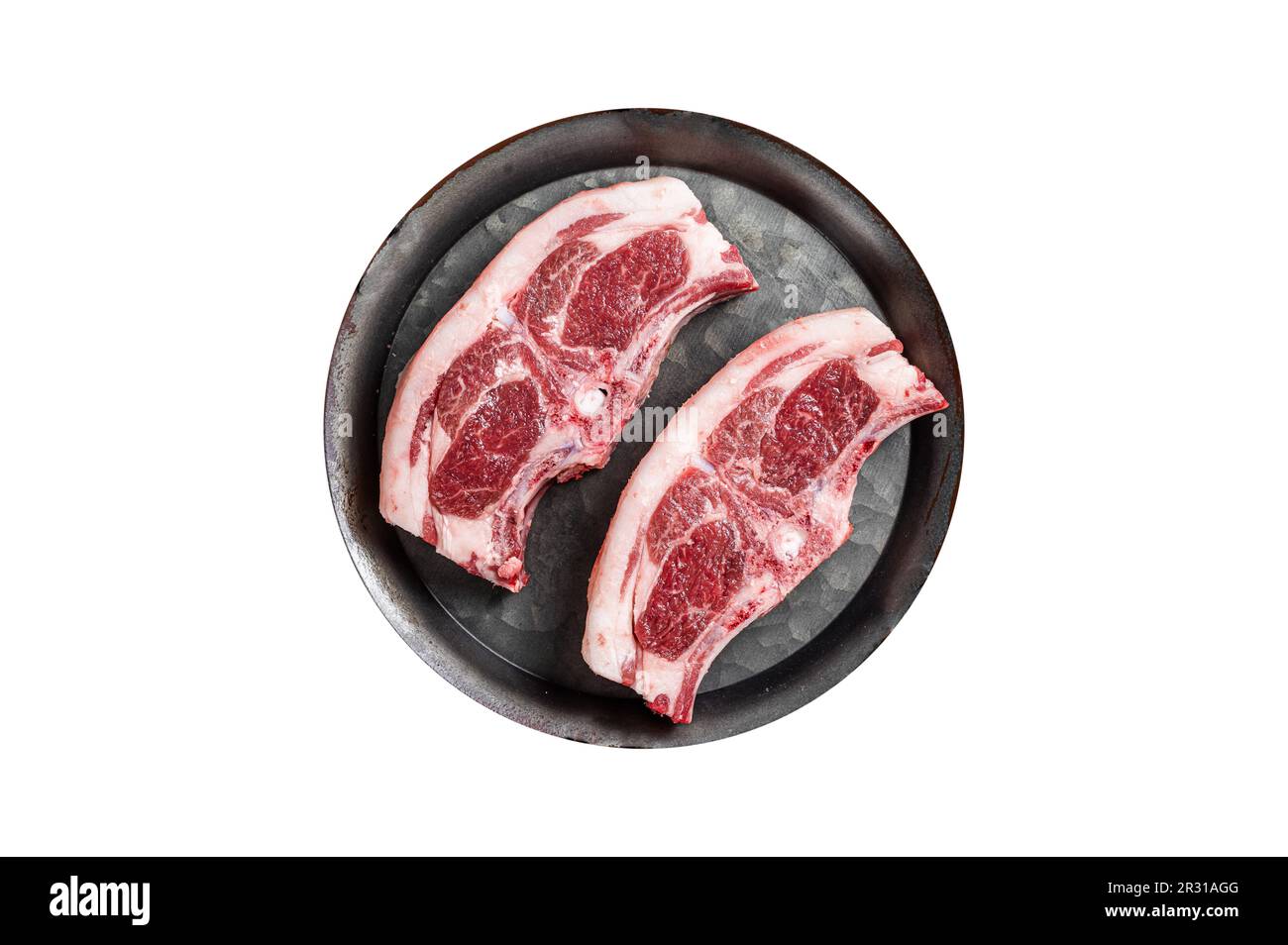Raw fresh lamb loin chops with herbs and spices in steel tray. Isolated ...