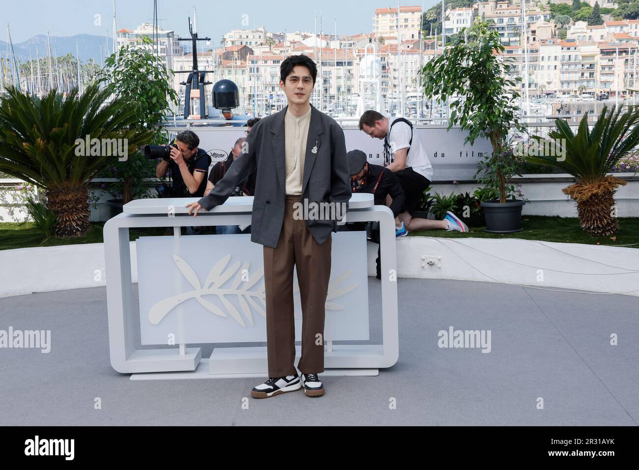 Haoran Liu poses for photographers at the photo call for the film 'The Breaking Ice' at the 76th ...
