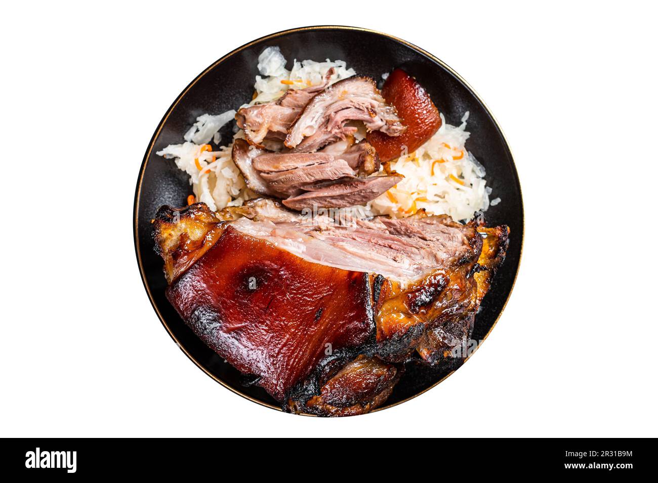 Roast Pork Ham Hock, knuckle with Sauerkraut on a plate. Isolated on ...