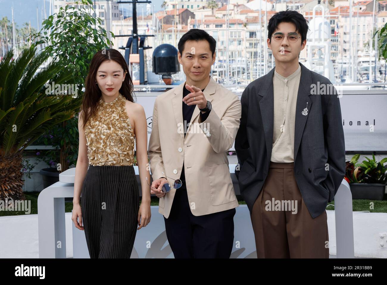 Dongyu Zhou, from left, director Anthony Chen, and Haoran Liu pose for ...