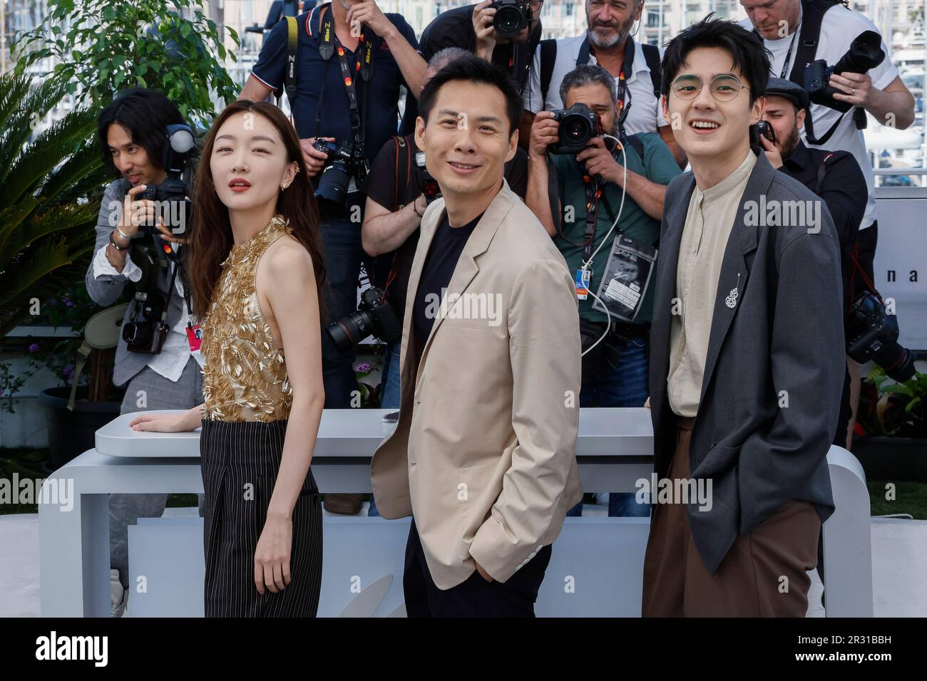 Dongyu Zhou, from left, director Anthony Chen, and Haoran Liu pose for ...