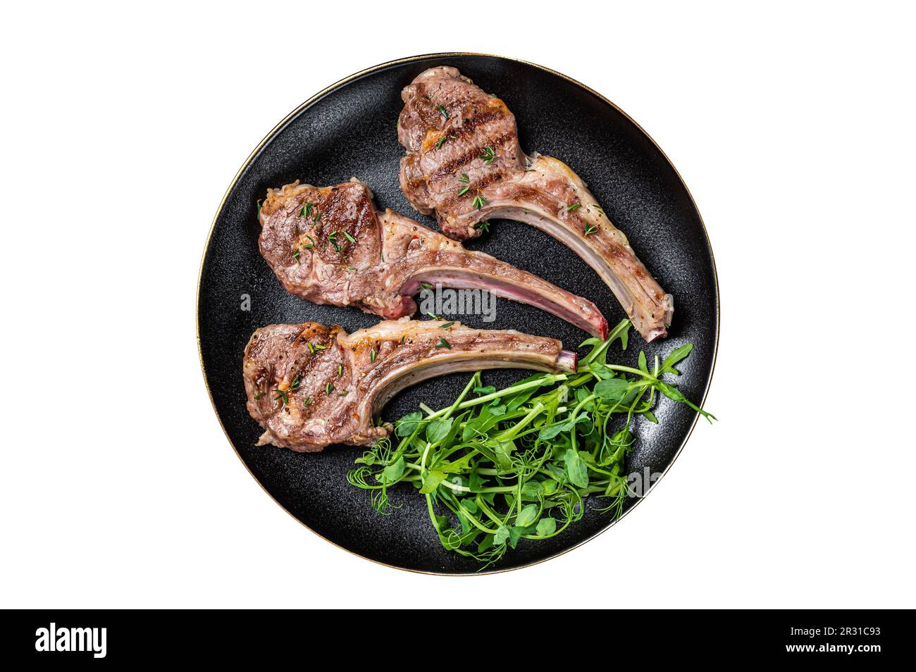 Roasted lamb meat cutlets, mutton chops with garnish. Isolated on white ...