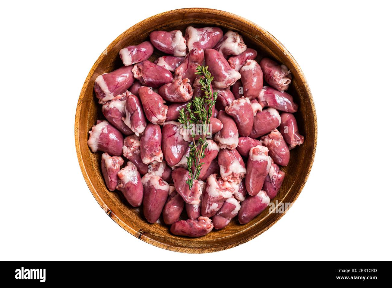 Raw chicken hearts in a wooden plate with herbs. Organic offals ...