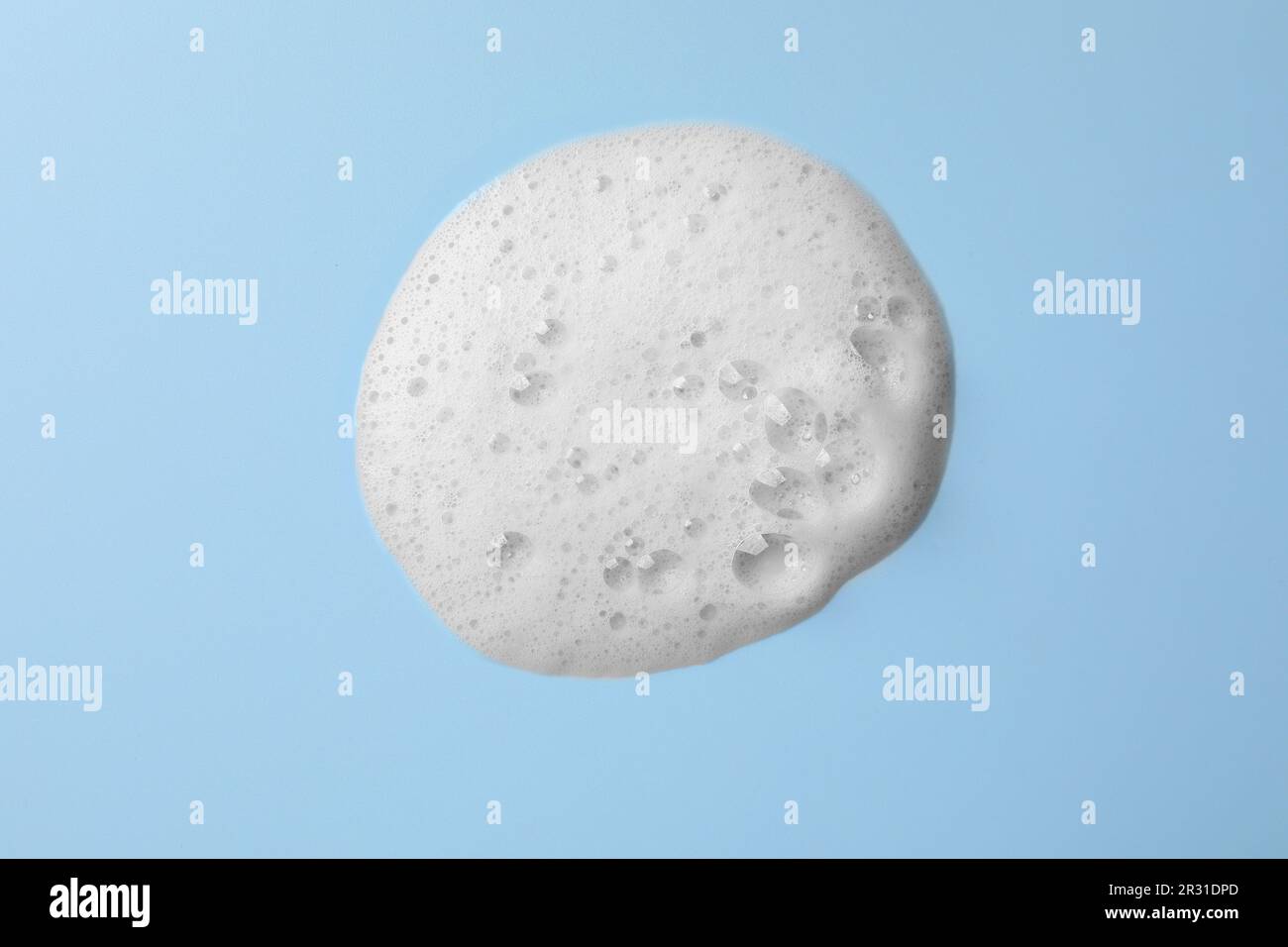Foam sample on light blue background, top view Stock Photo - Alamy