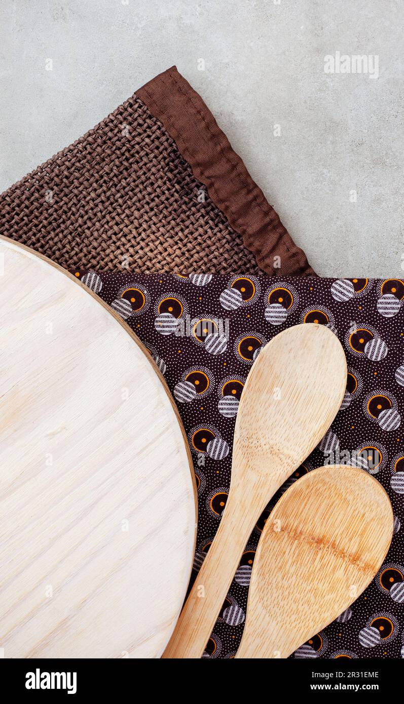 Background of gray with wood and traditional South African cloth with ...