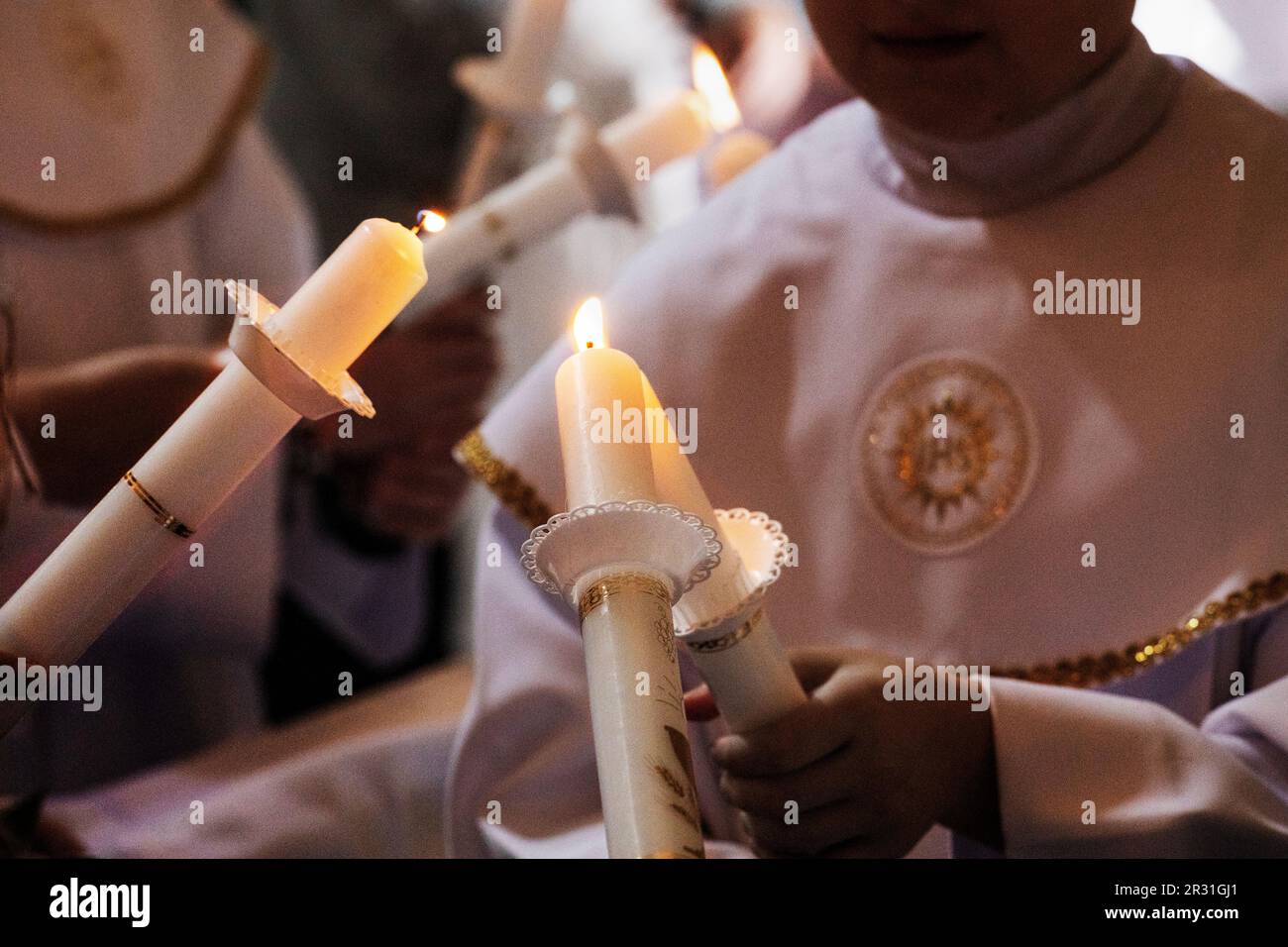 distribute fire from the candle of the peace candle to other candles at ...
