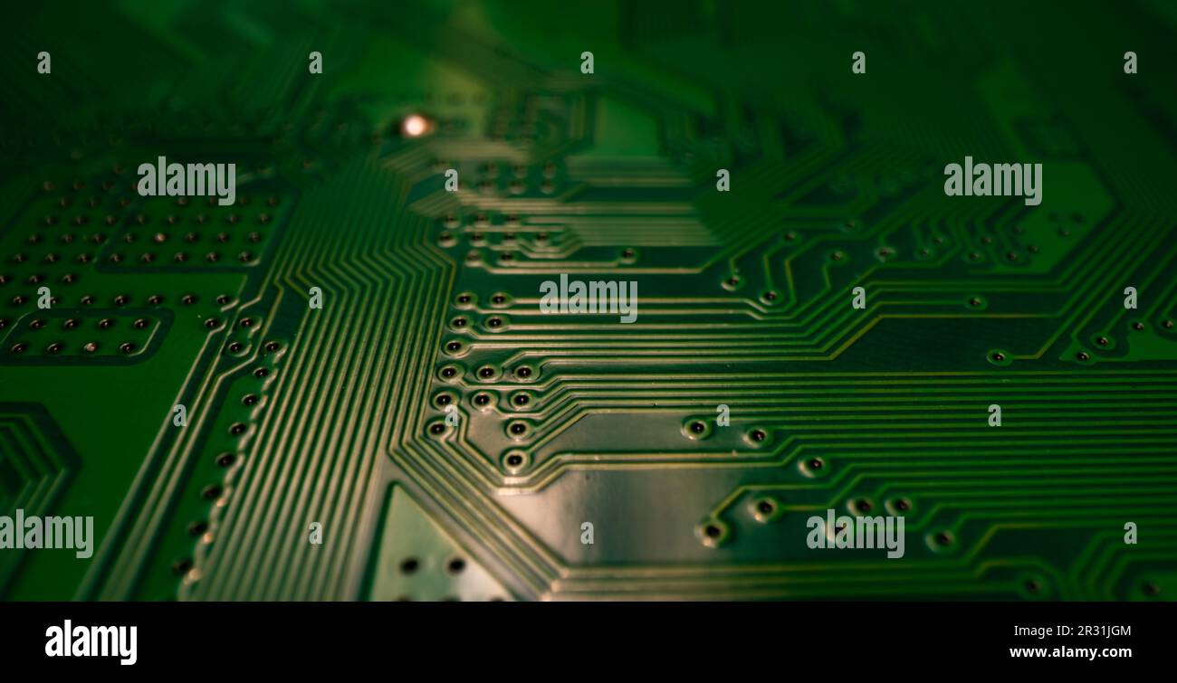 Electronic circuit board closeup. Electronic motherboard card. Circuitry and close-up on ...