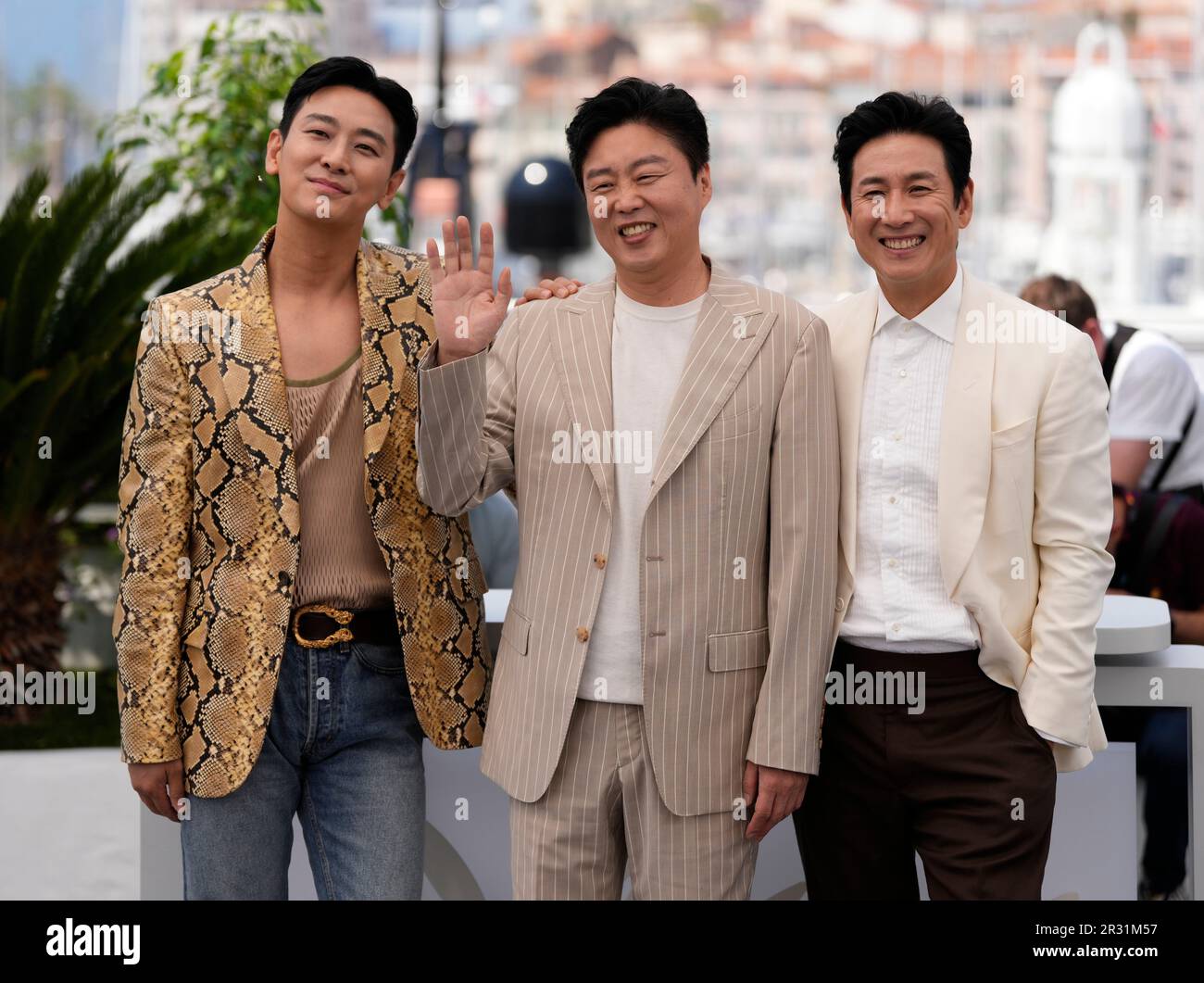 Ju Ji-hoon, from left, and Kim Hee-won and Lee Sun-kyun pose for ...