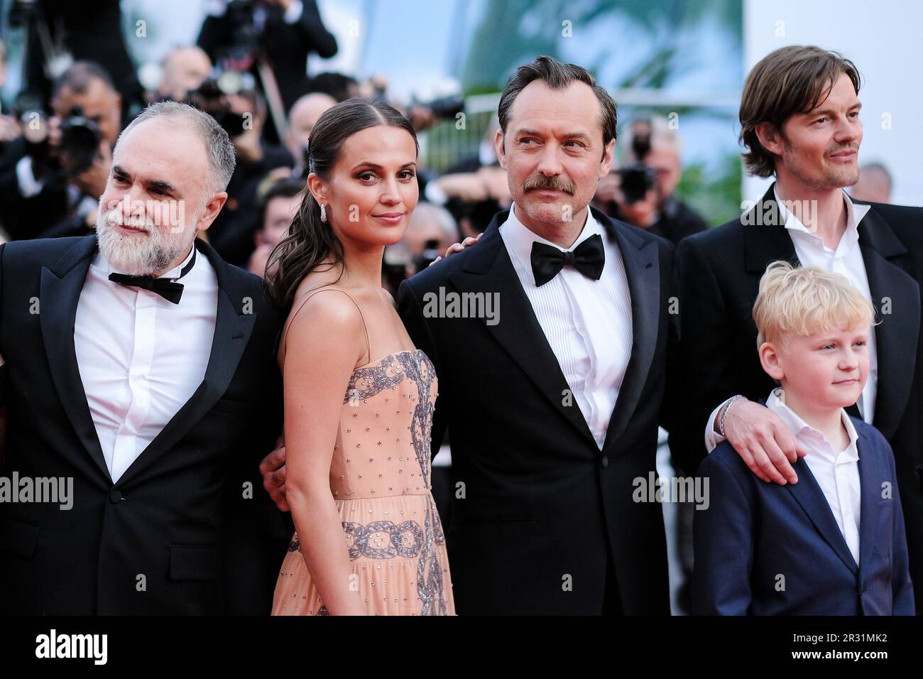 Cannes, France. 21st May, 2023. Karim Ainouz, Alicia Vikander, Jude Law ...