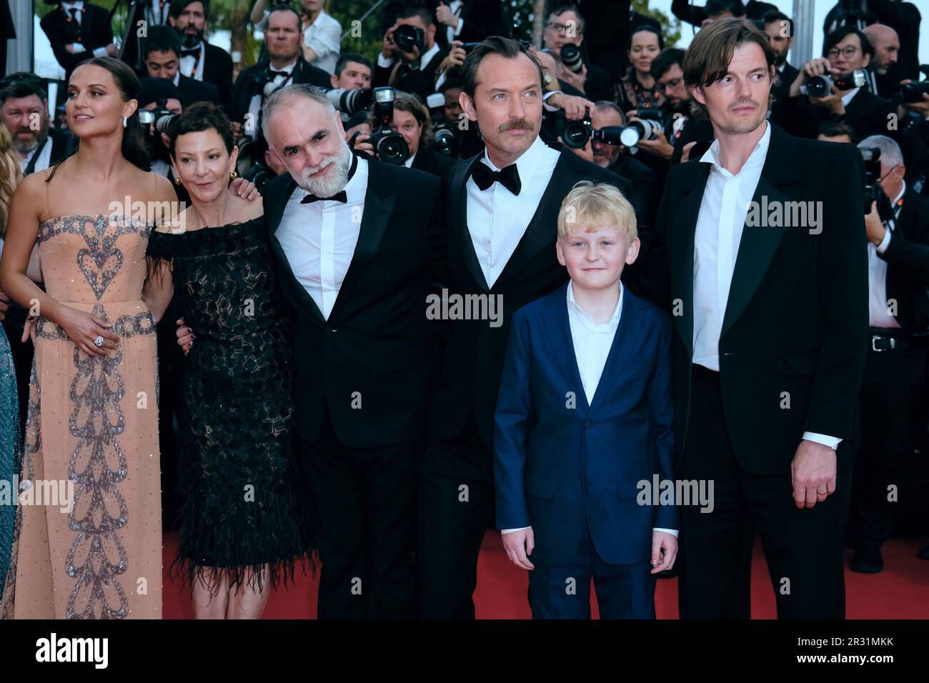 Cannes, France. 21st May, 2023. Karim Ainouz, Alicia Vikander, Jude Law ...