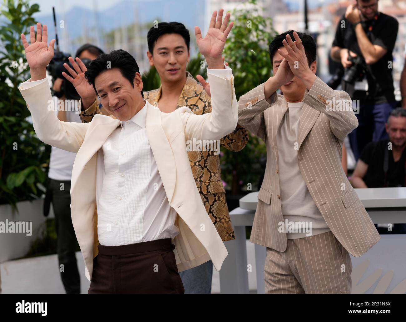 Lee Sun-kyun, front left, Ju Ji-hoon and Kim Hee-won pose for ...