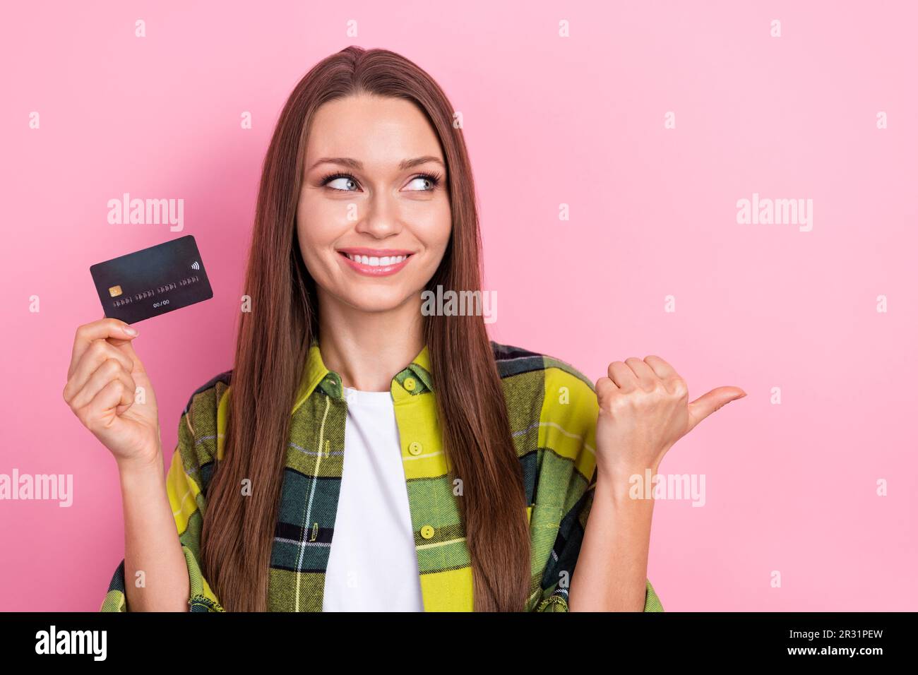 Photo of positive nice lady toothy smile hold debit card look direct ...