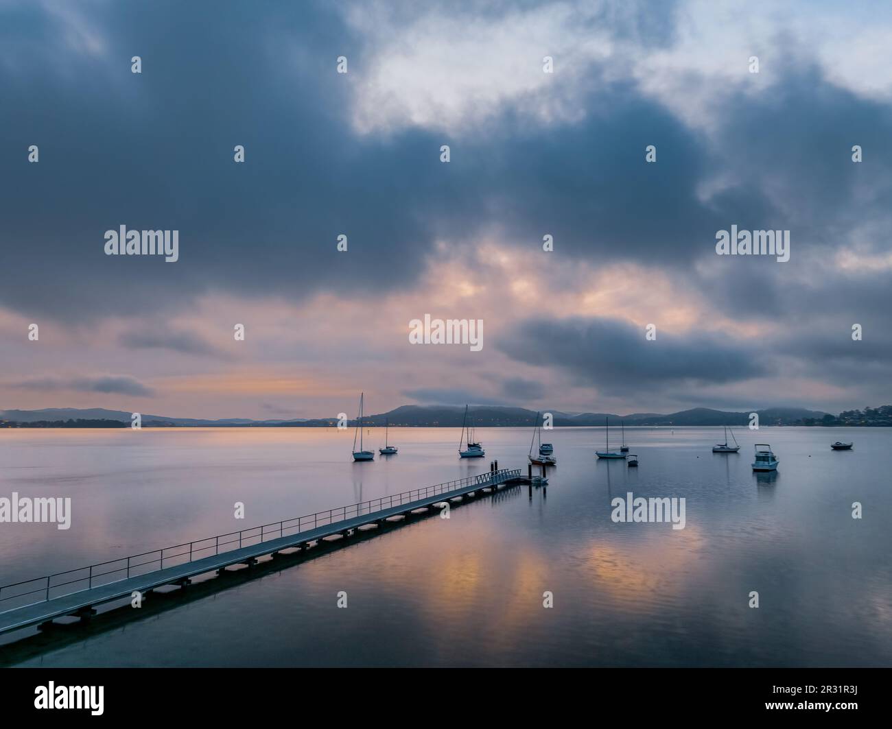Aerial sunrise with fog drifiting over Brisbane Water at Koolewong on ...