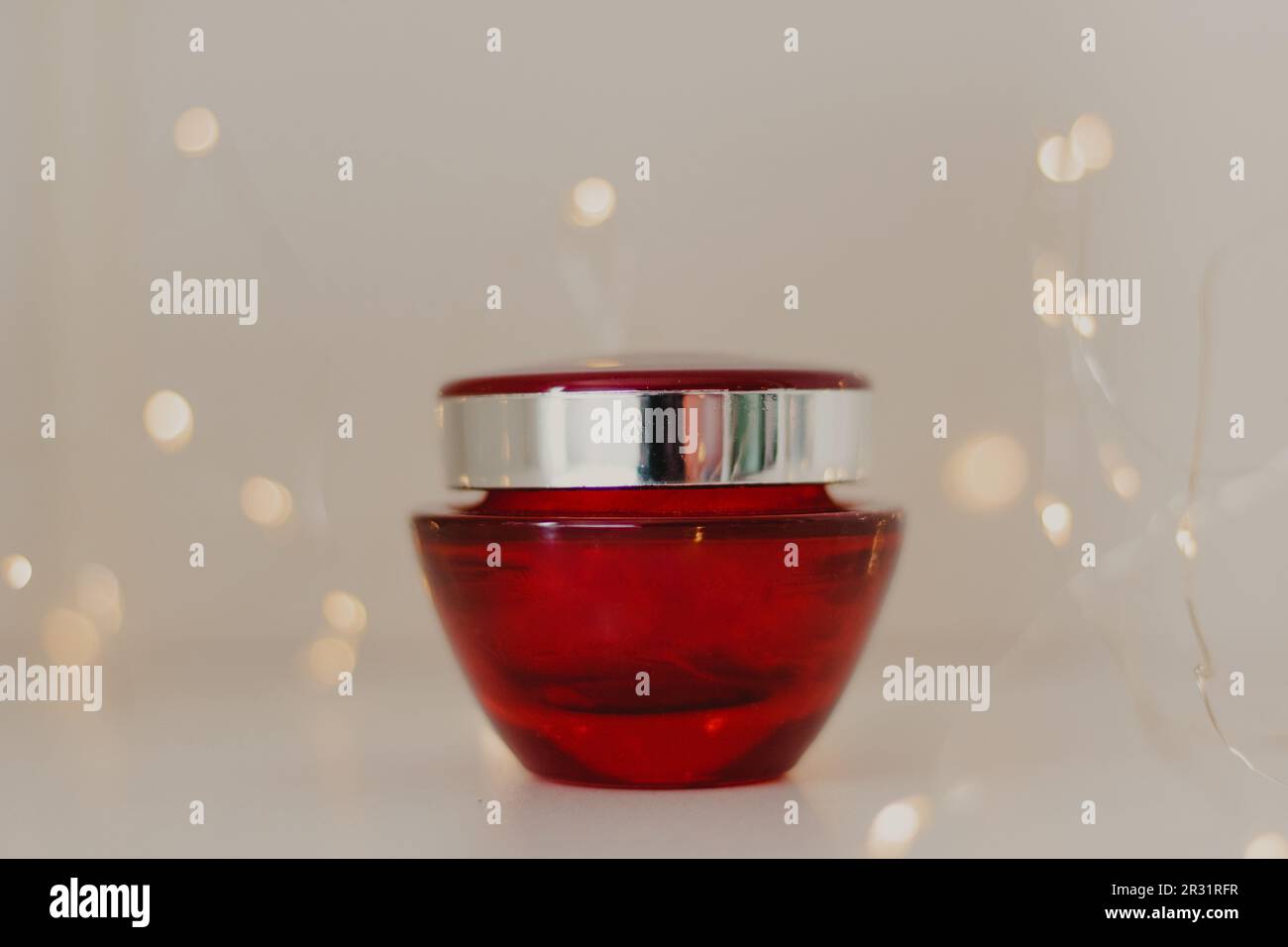 pretty red moisturizer jar Stock Photo - Alamy