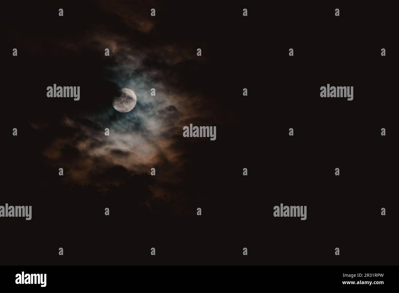 full moon lighting up the sky Stock Photo - Alamy