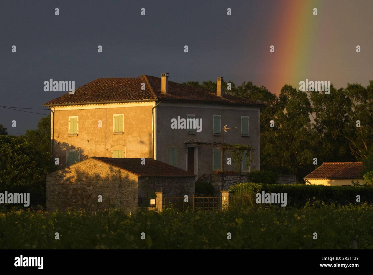 House with rainbow Stock Photo - Alamy