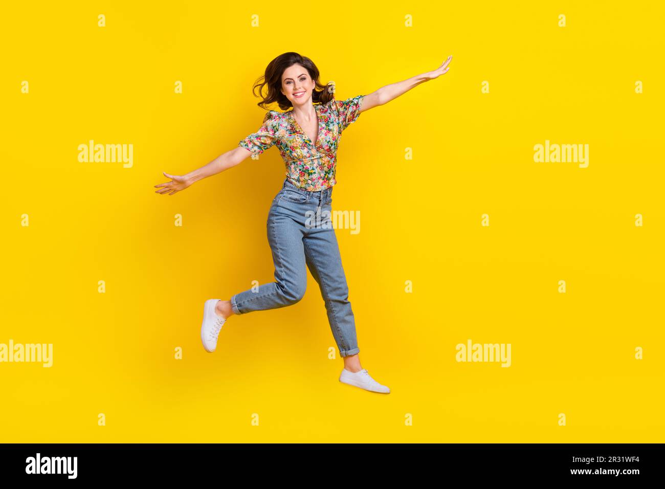 Full size photo of jumping fly hands wings girl wearing trendy flowers ...