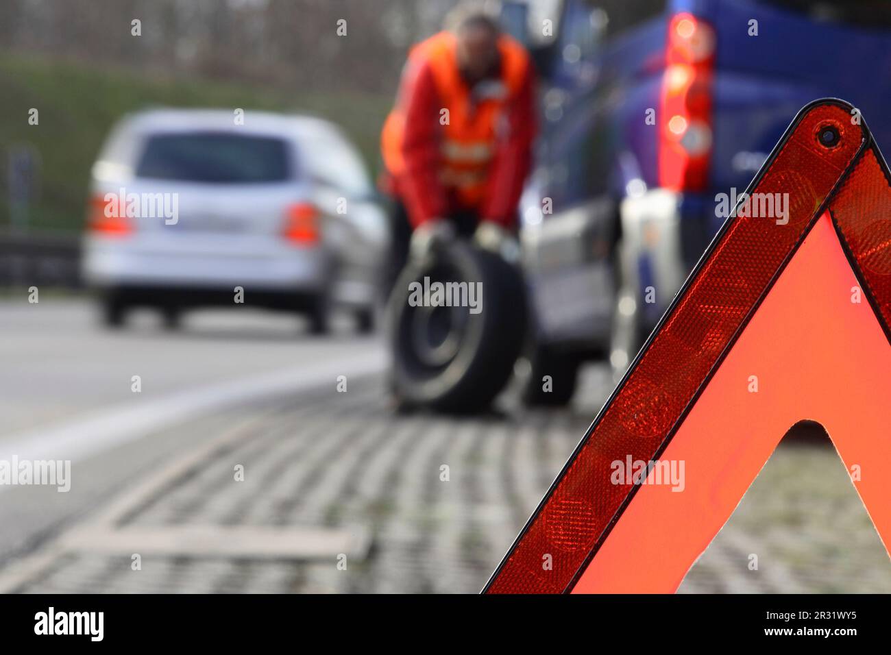 Warning triangle, car breakdown Stock Photo - Alamy