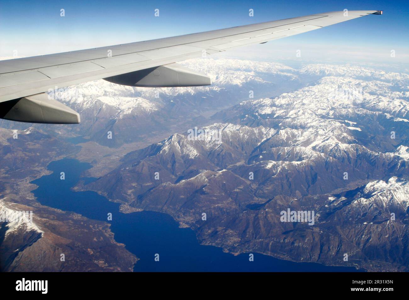 Airplane over mountain lake hi-res stock photography and images - Alamy