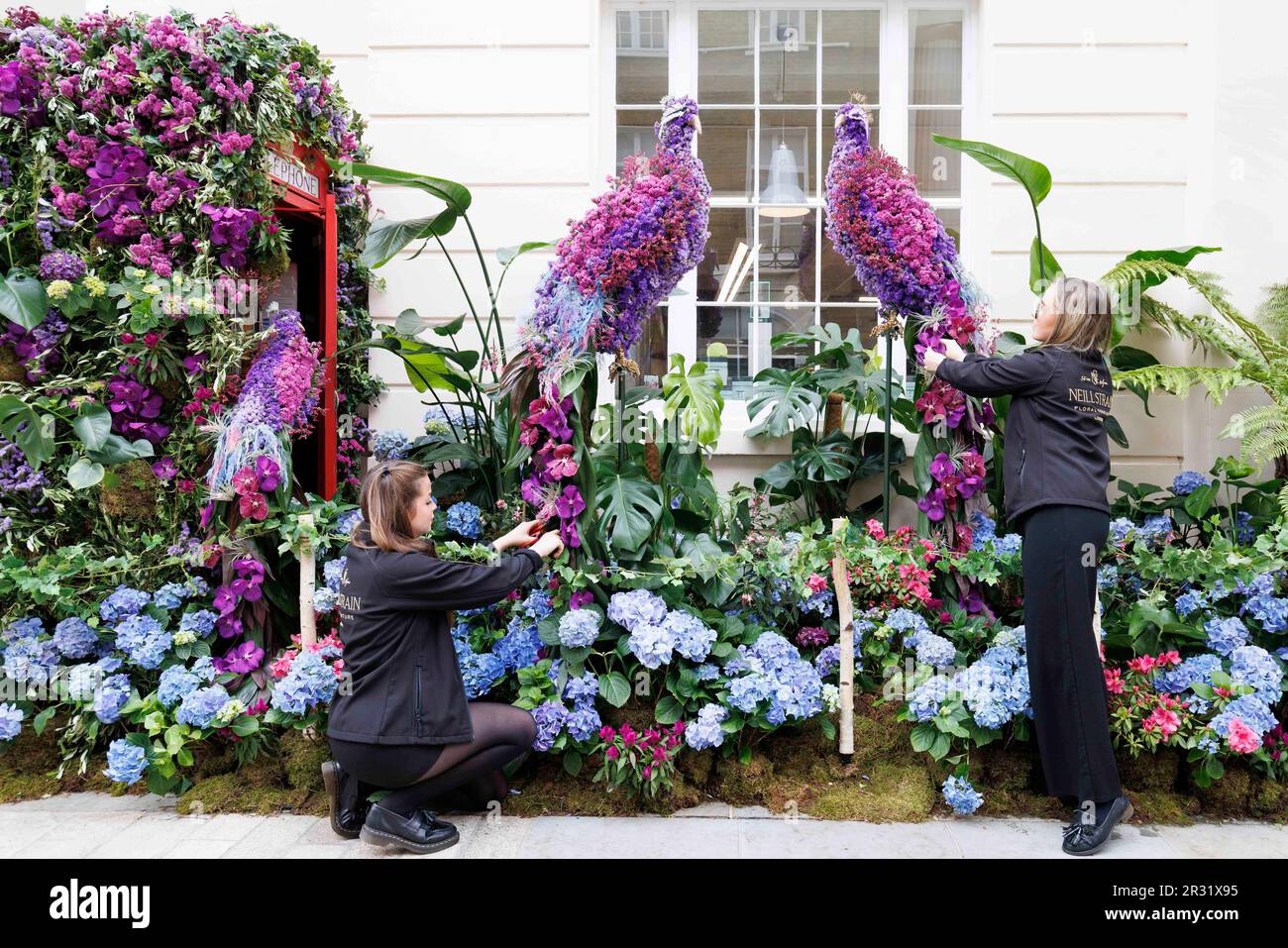 EDITORIAL USE ONLY Florists from Neill Strain Floral Couture put the ...