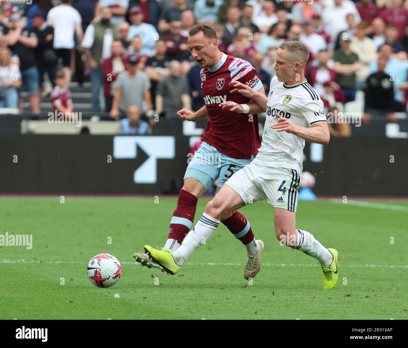 L-R West Ham United's Vladimir Coufal and Adam Forshaw of Leeds United ...