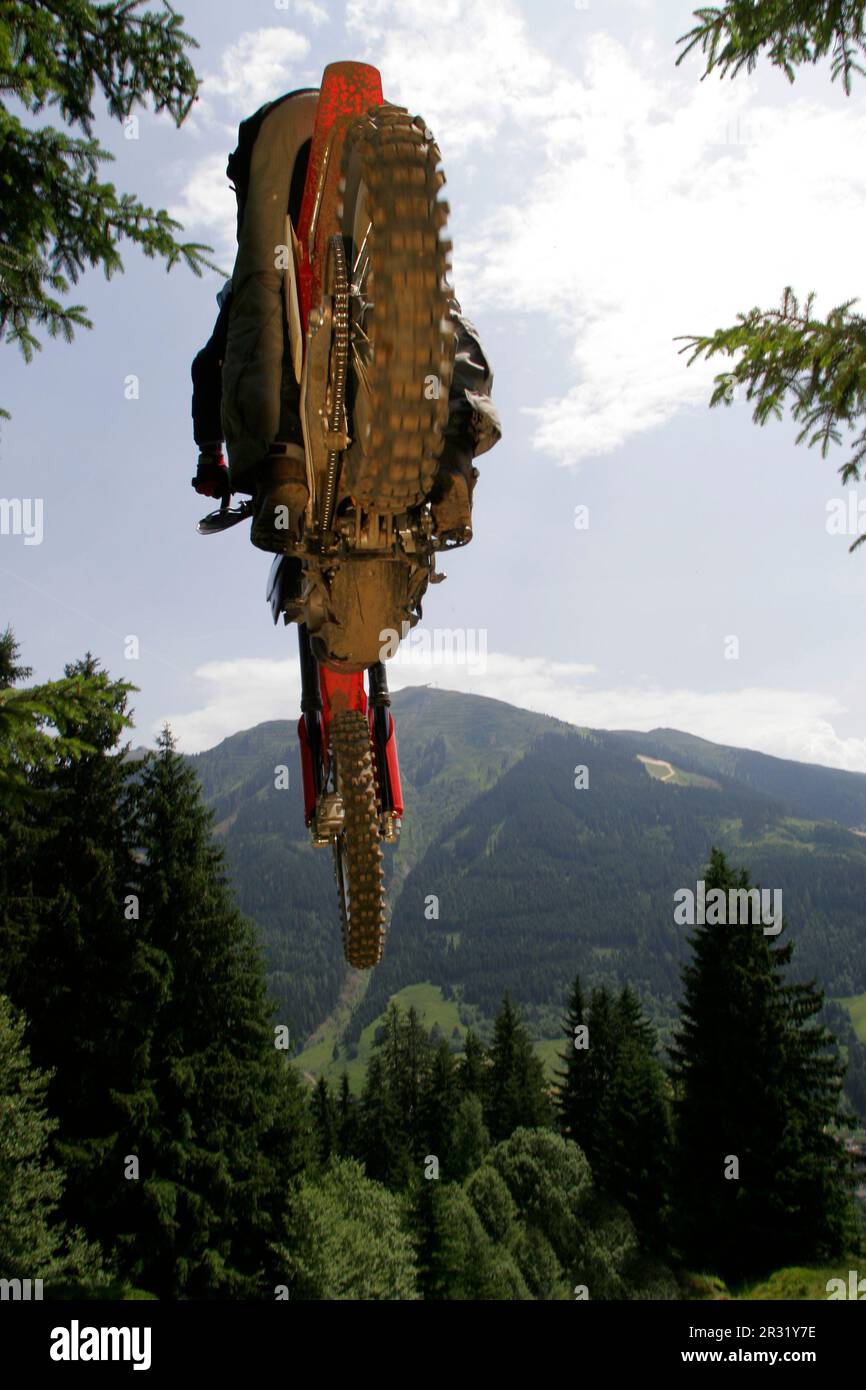 Motorcycle in jump Stock Photo - Alamy