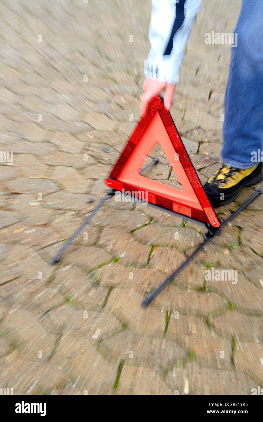 Warning triangle, car breakdown Stock Photo - Alamy