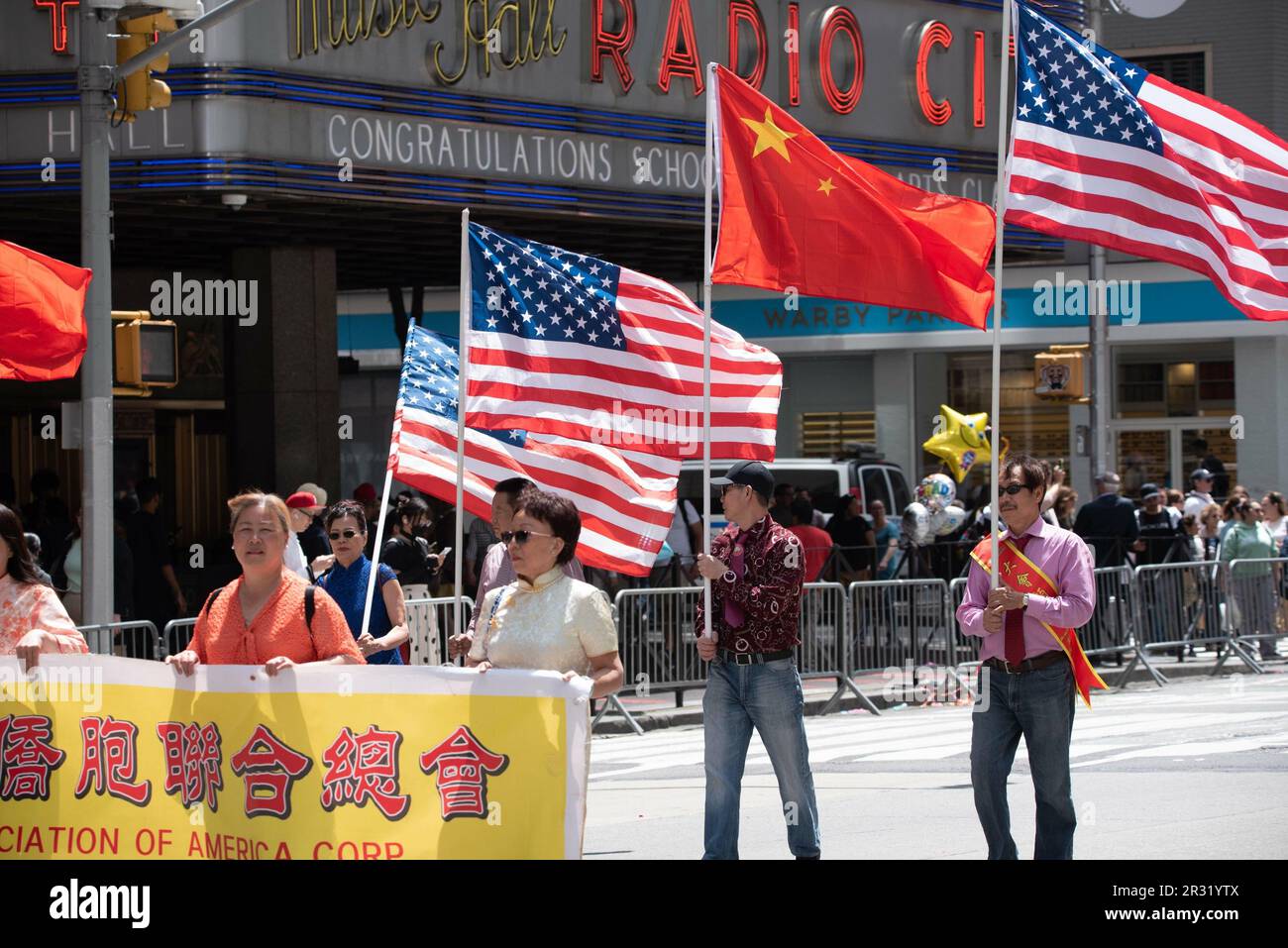 May 21, 2023, %G: (NEW) Asian men with American and Chinese flags at ...