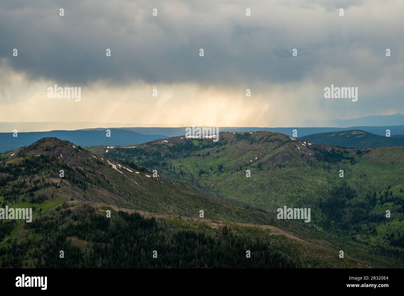 Row of Rain Clouds Moves Across Yellowstone Wilderness Below Mount ...