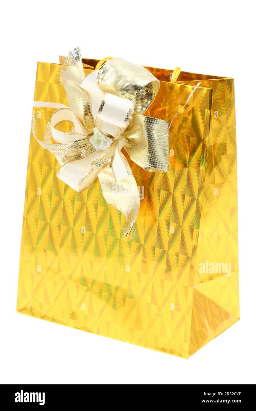 Yellow bag gift present Cut Out Stock Images & Pictures - Alamy