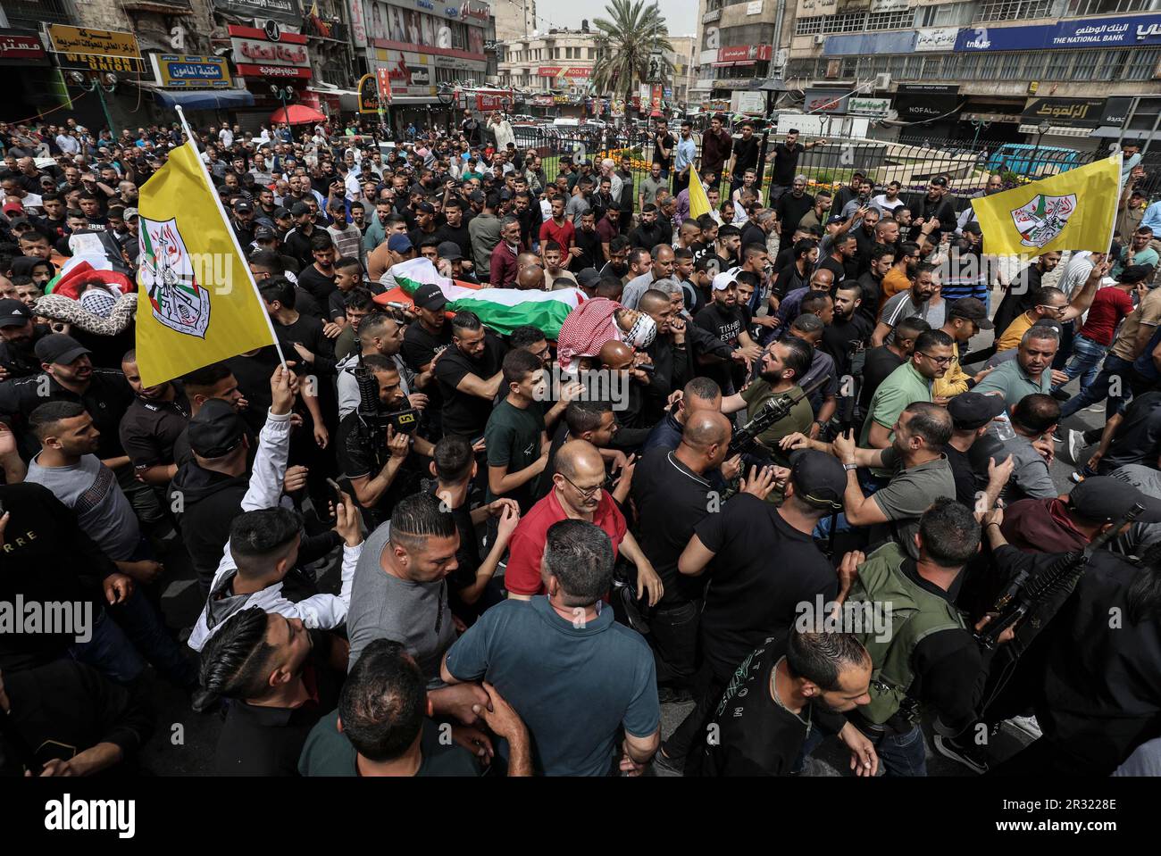 Nablus, Palestinian Territories. 22nd May, 2023. Mourners carry the ...