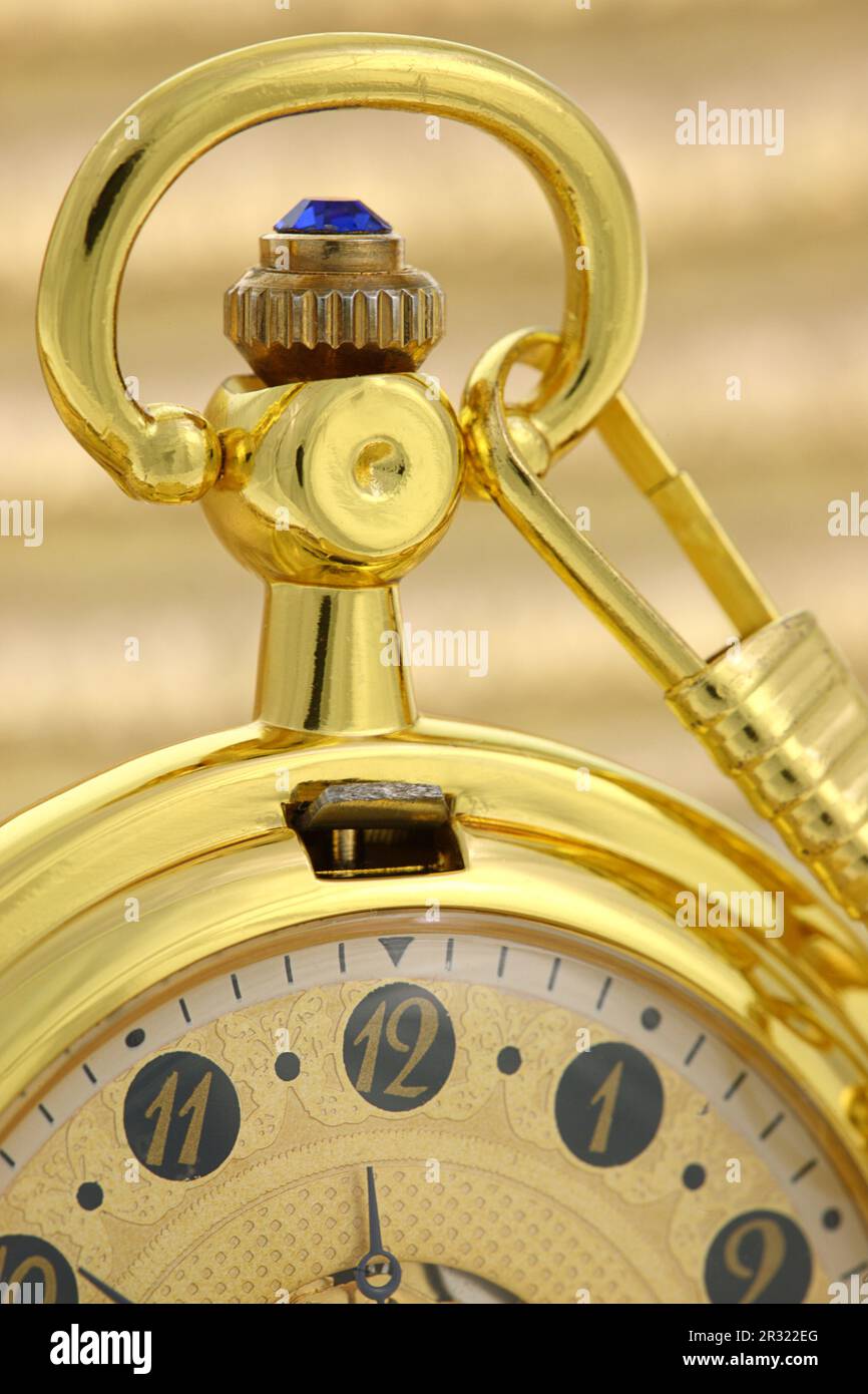 Golden pocket watch Stock Photo - Alamy