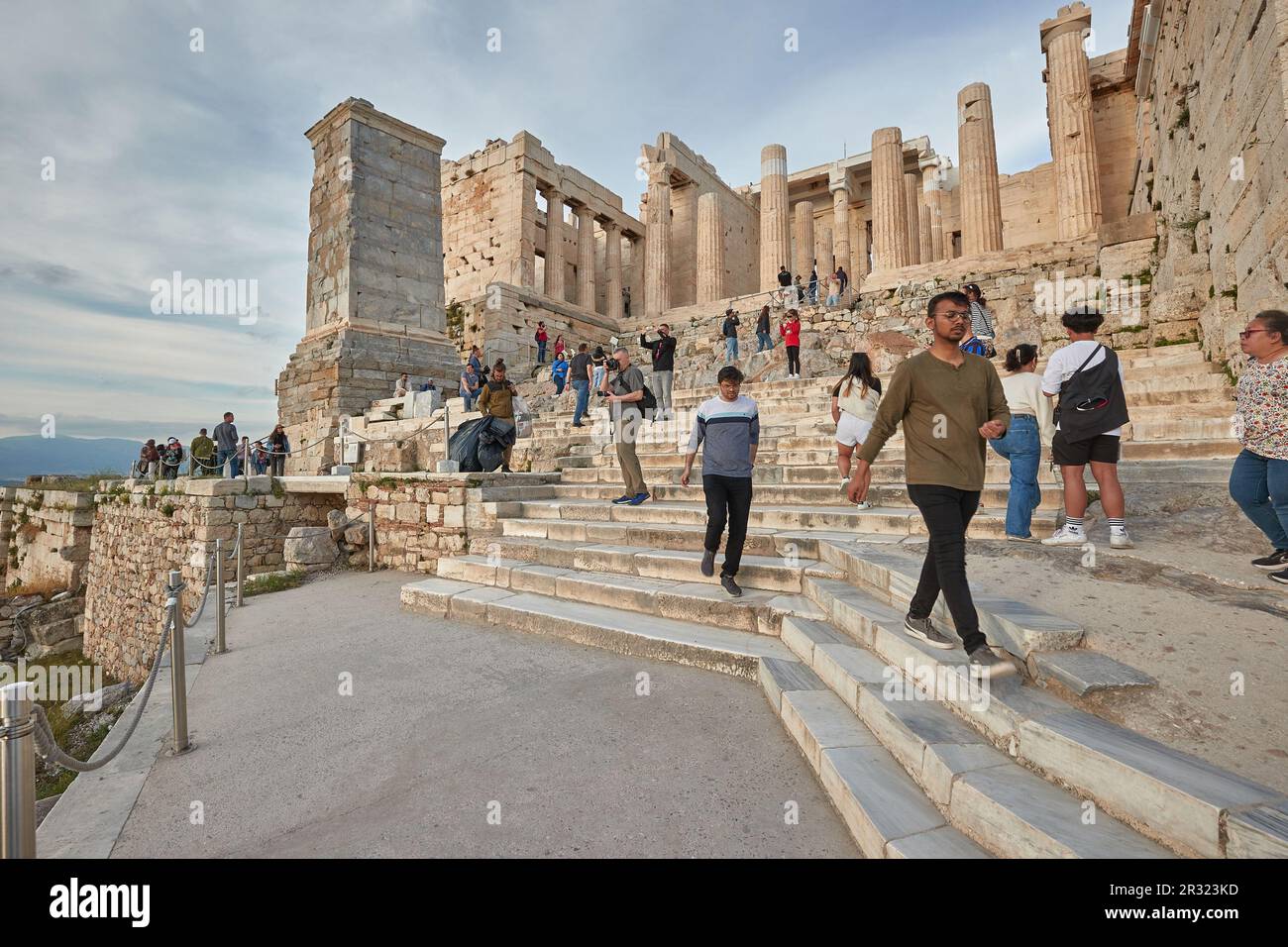 Acropolis of Athens, entrance gate pillars with tourists Stock Photo ...