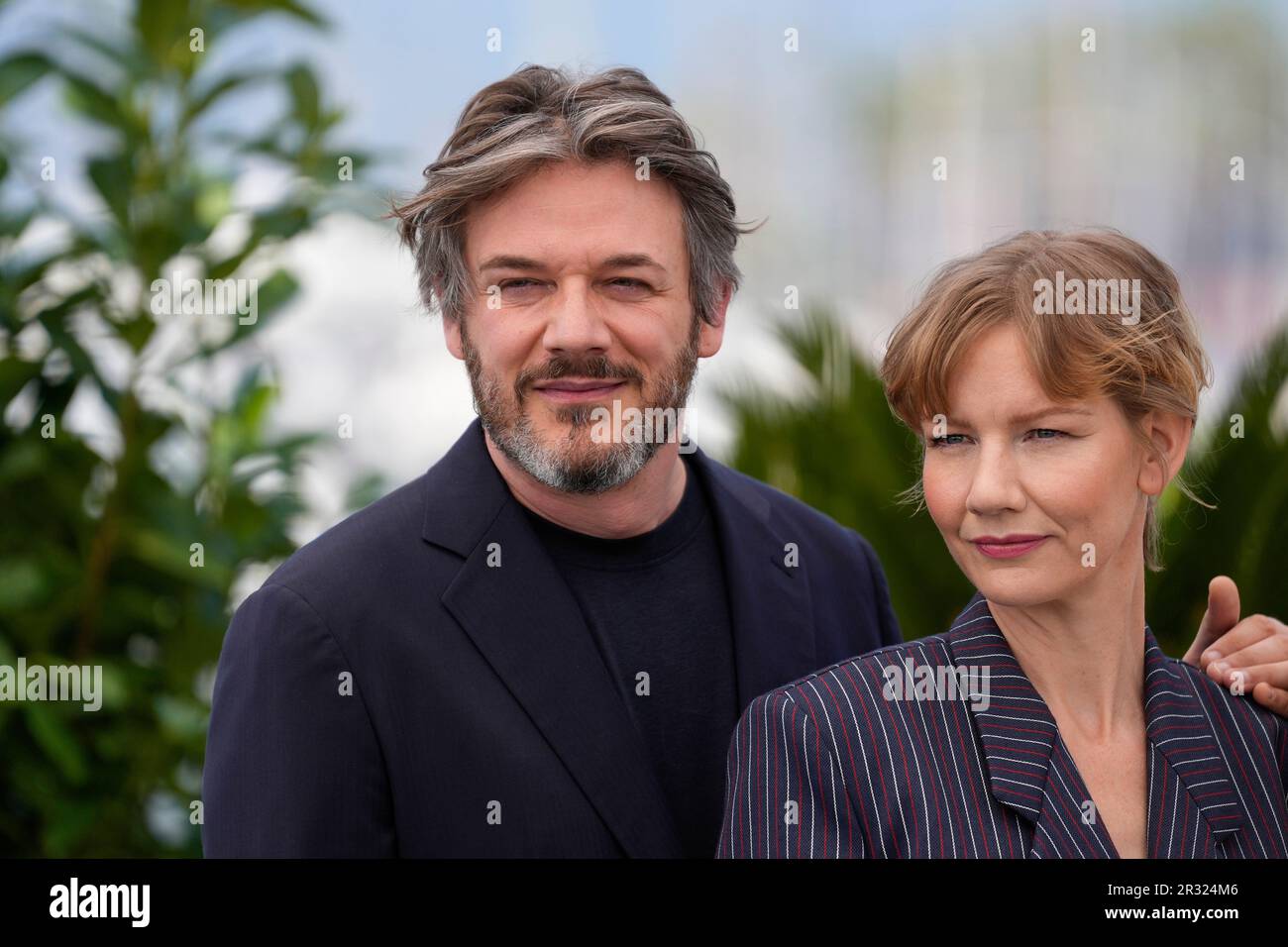 Samuel Theis, left, and Sandra Huller pose for photographers at the ...