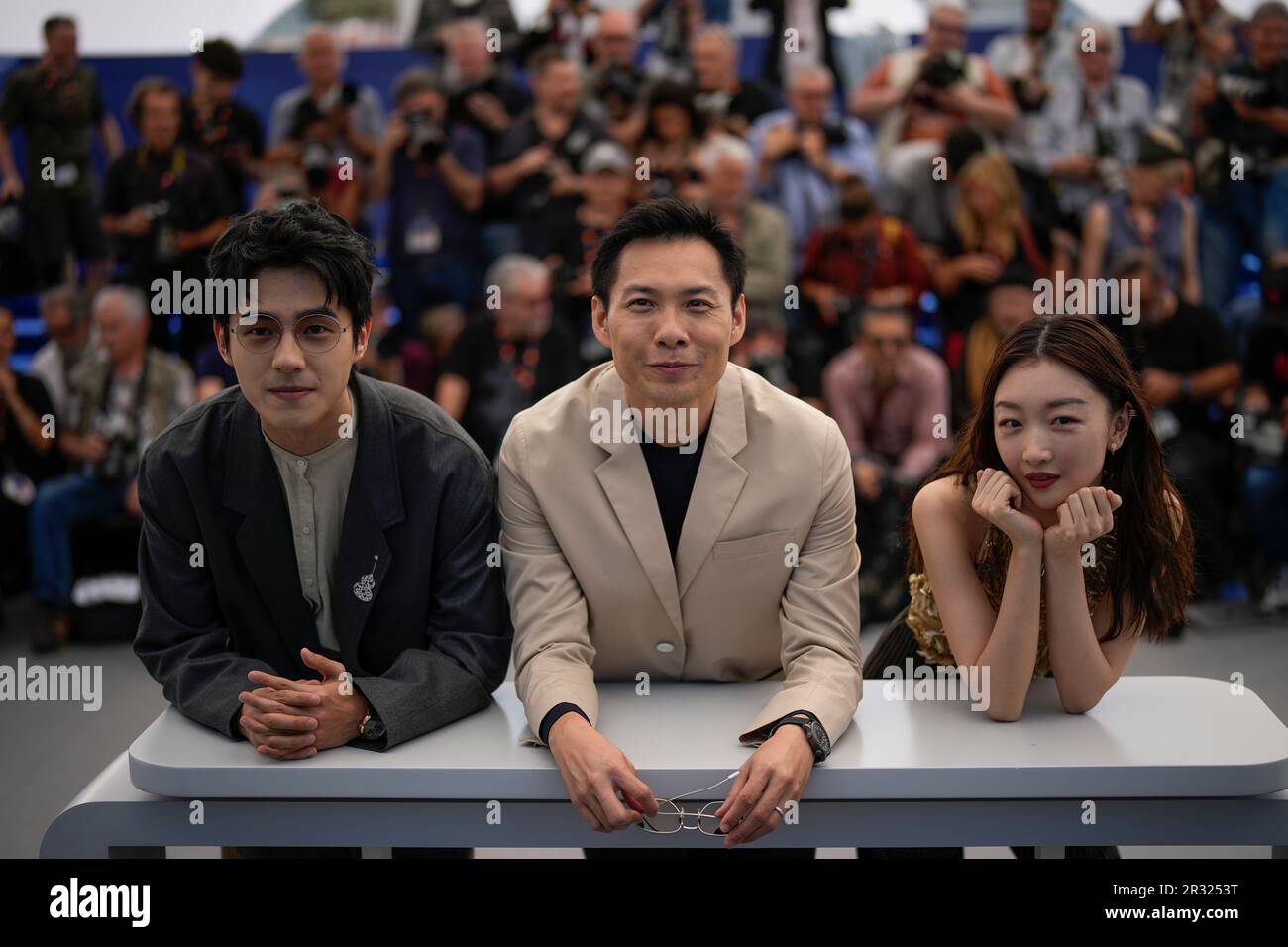 Haoran Liu, from left, director Anthony Chen, and Dongyu Zhou pose for photographers at the ...