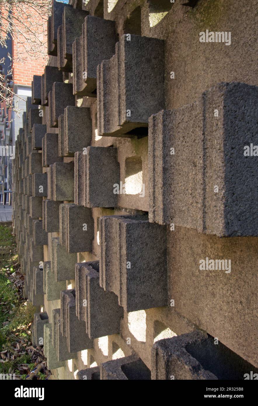 strange block wall with sun light in the gaps Stock Photo - Alamy