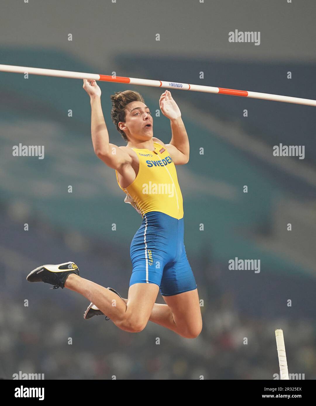 Armand Duplantis participating in the pole vault at the Doha 2019 World ...