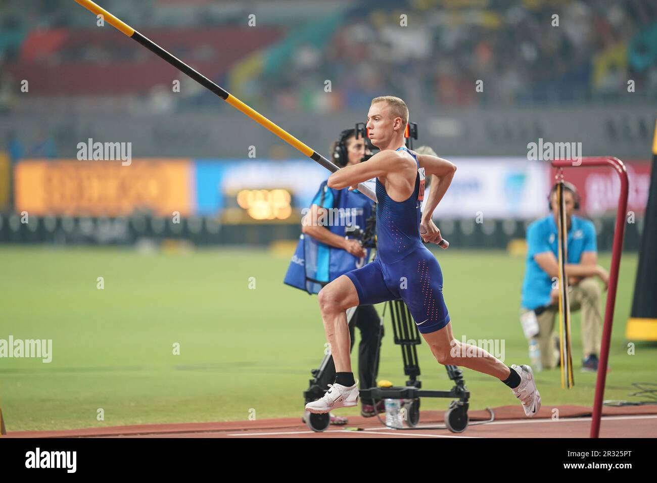 Sam Kendricks participating in the pole vault at the Doha 2019 World ...