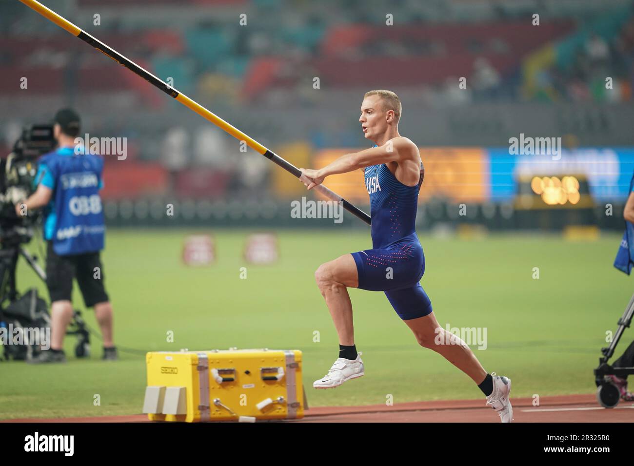 Sam Kendricks participating in the pole vault at the Doha 2019 World ...