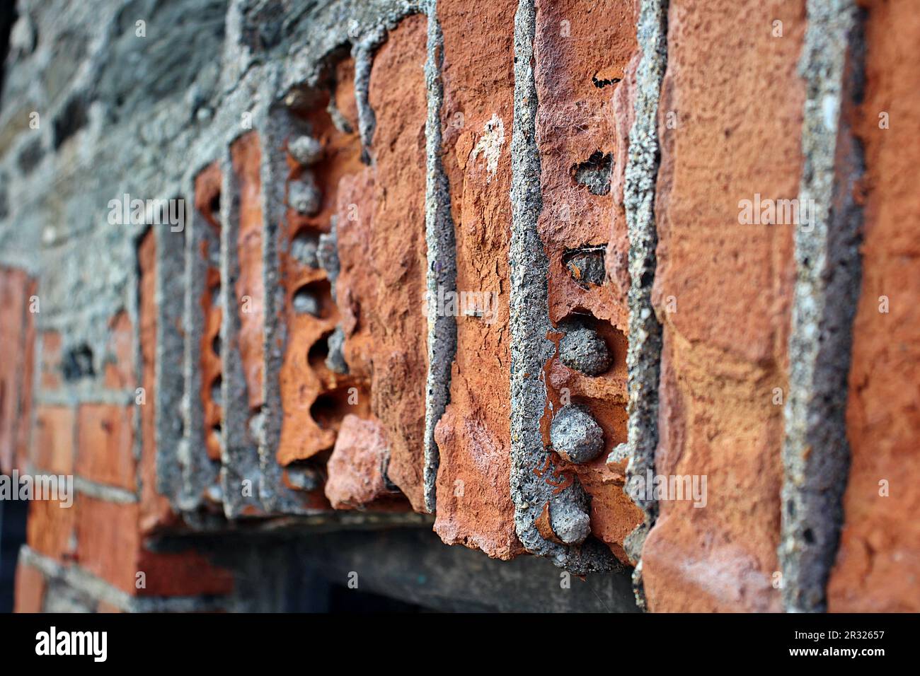 traditional Cornish wall building material worn away by the salt water ...