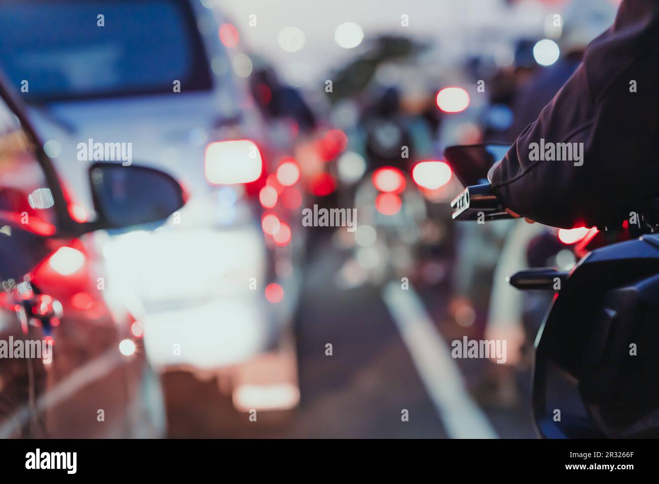 traffic jam from cars during rush hours on a city street in indonesia ...